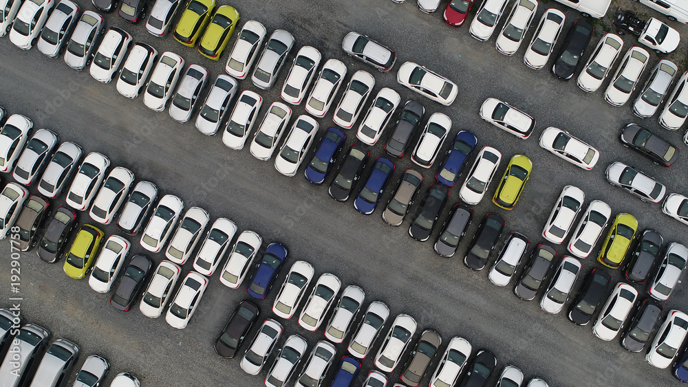 Aerial Top view of new cars lined up at Industrial factory Port ...
