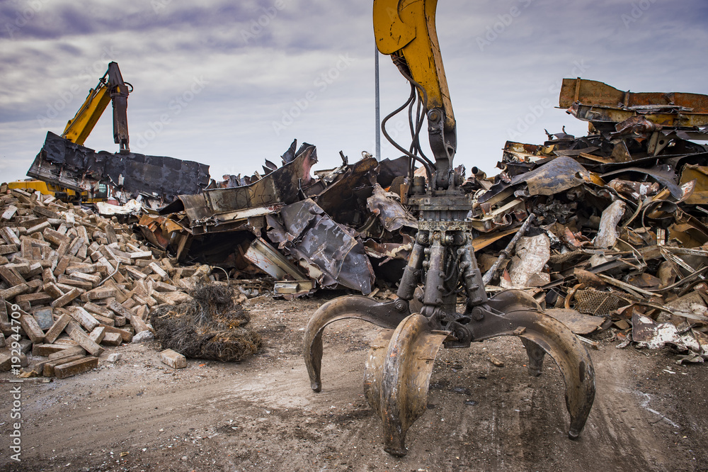 Scrap recycling plant, Crane grabber, pile metal to recycle Stock Photo ...