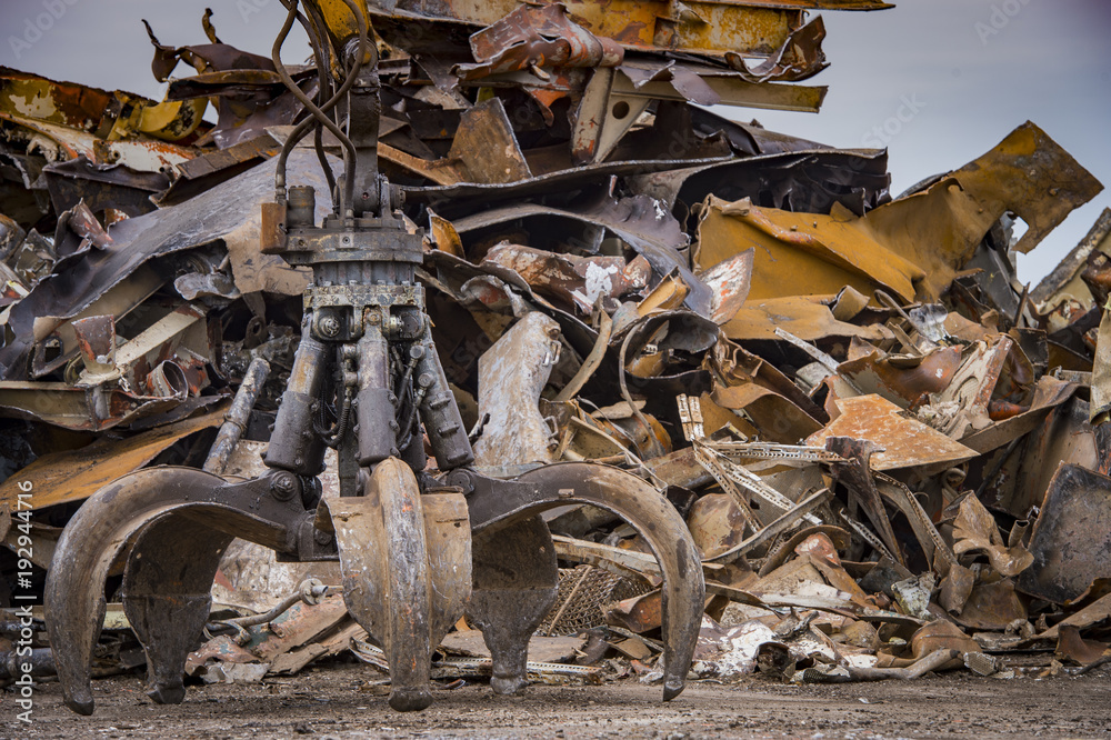 Scrap recycling plant, Crane grabber, pile metal to recycle Stock Photo ...
