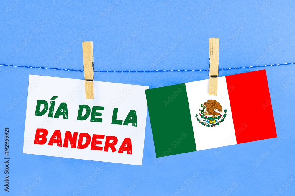 The text in Spanish: the day of the flag. Text with the flag of Mexico ...