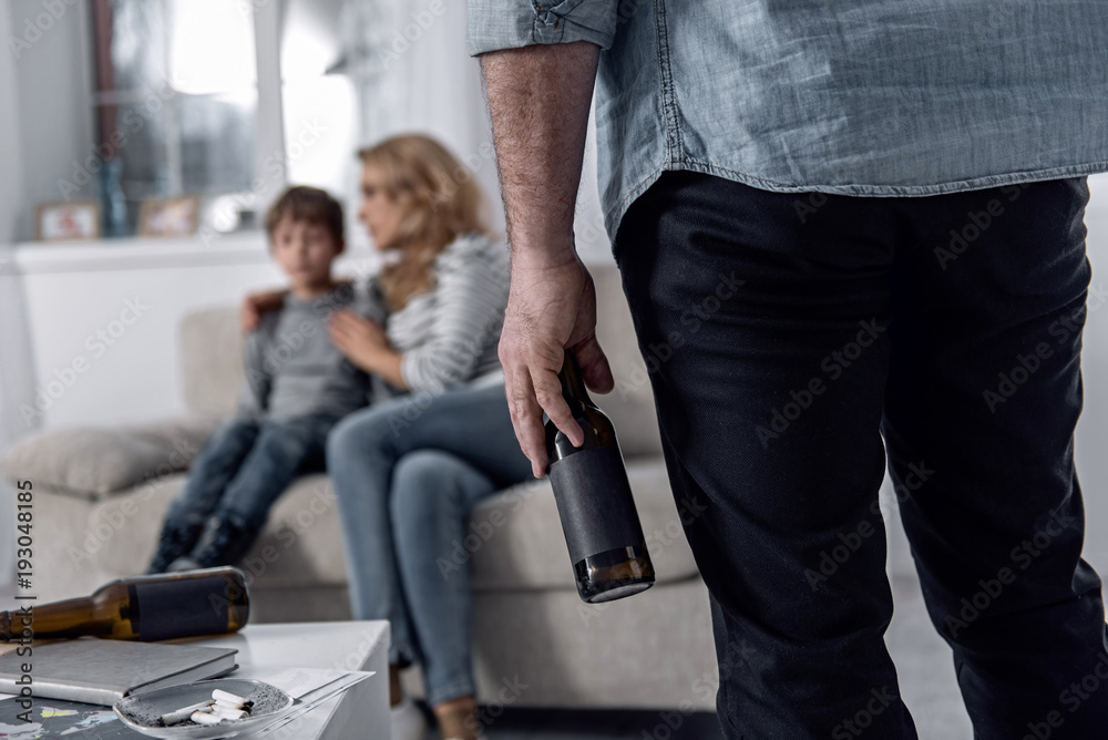 Foto de Personal values. Ill man suffering from alcohol addiction ...