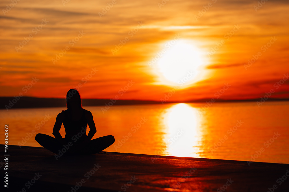 Carefree calm woman meditating in nature.Finding inner peace.Yoga ...