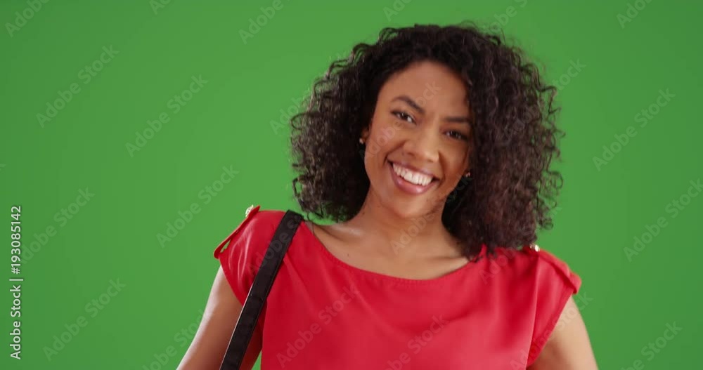 Vidéo Stock Beautiful Black woman with radiant smile twirling on ...
