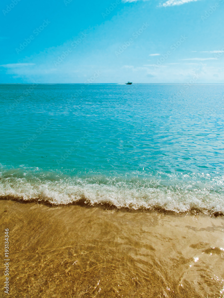 Sand beach and water in summer sunny day. Beautiful ocean view with a ...