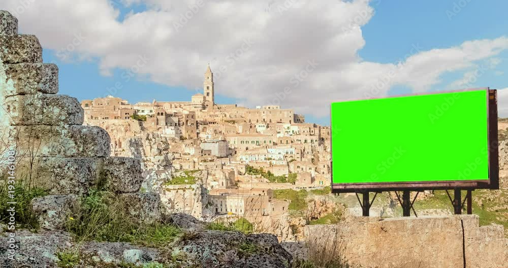 empty billboard with chroma key green screen, panoramic view of typical ...