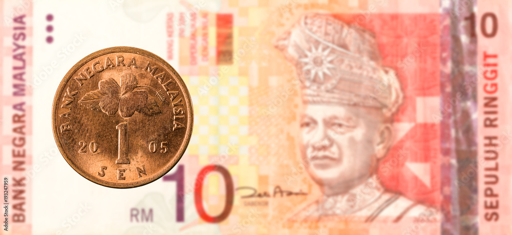 1 malaysian sen coin against 10 malaysian ringgit bank note obverse ...