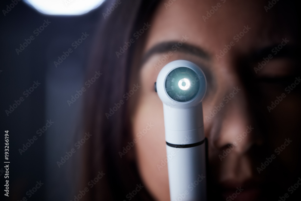 Female doctor using otoscope for examination, close up Stock Photo ...