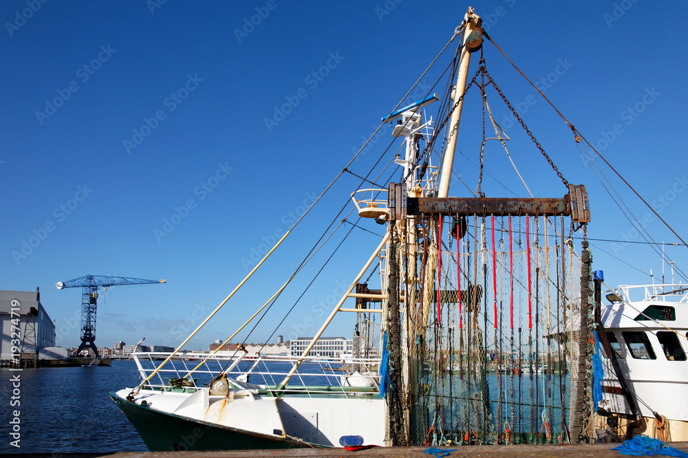 Colorful pulse trawl on a pulse trawls vessel in the harbour with a ...