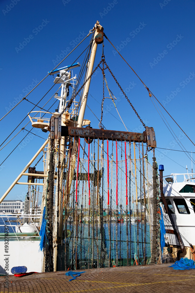 Colorful pulse trawl on a pulse trawls vessel in the harbour with a ...