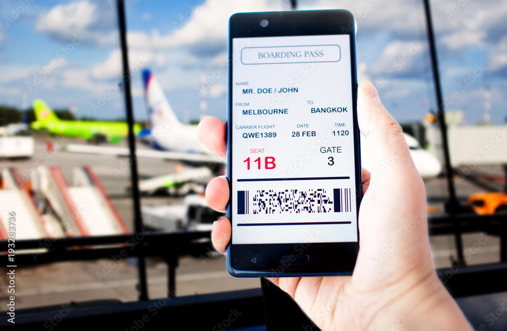 Electronic boarding pass on the screen of smartphone. Concept of modern ...