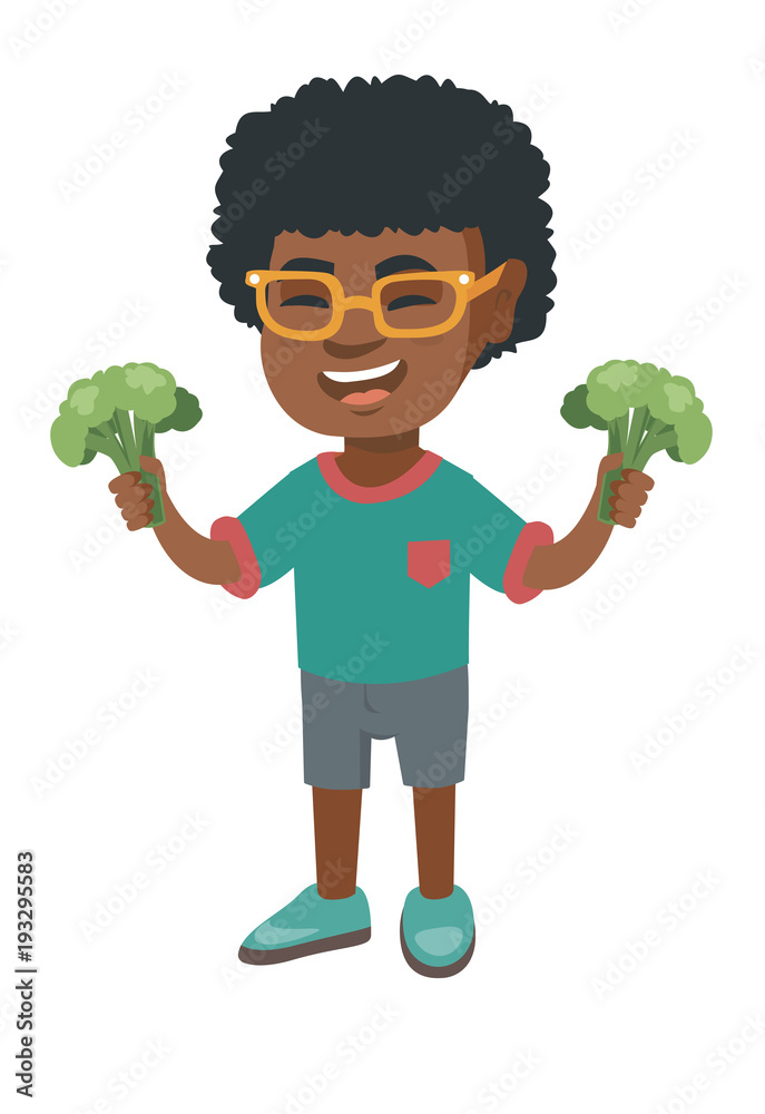 Little african boy laughing and holding broccoli. Full length of ...