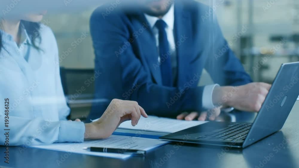Lawyer and Client Go through Documents and Contact, Finalising the Deal ...