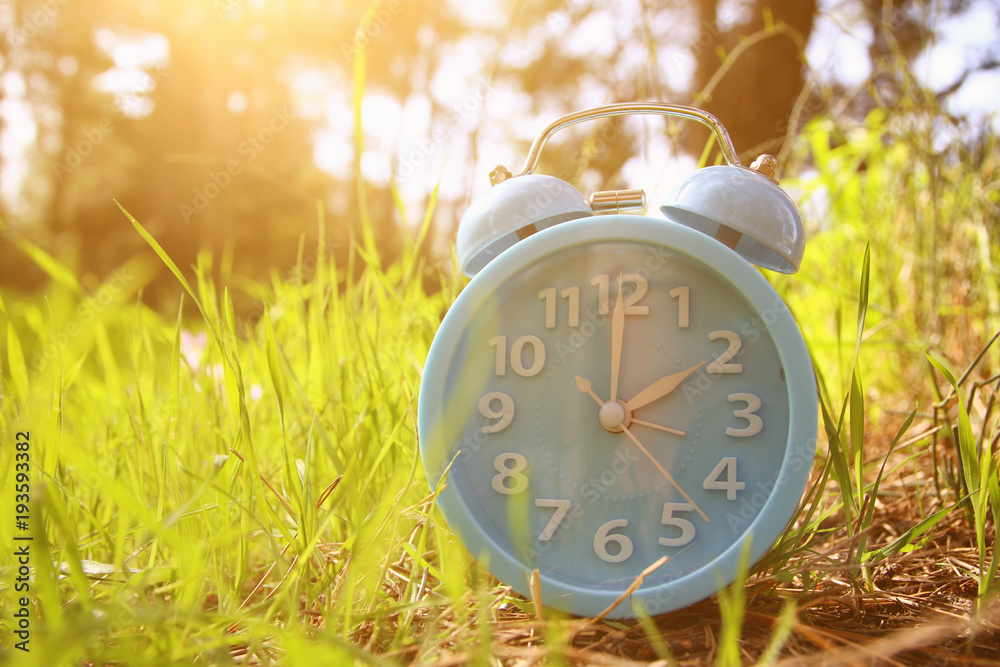 Image of spring Time Change. Summer back concept. Vintage alarm Clock ...