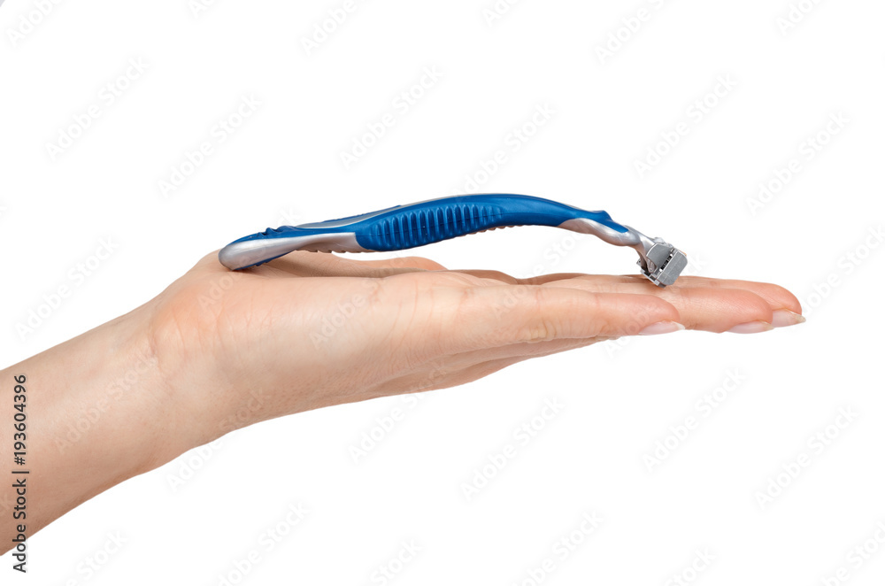 Disposable shaving razor blade in hand. Isolated on white background ...
