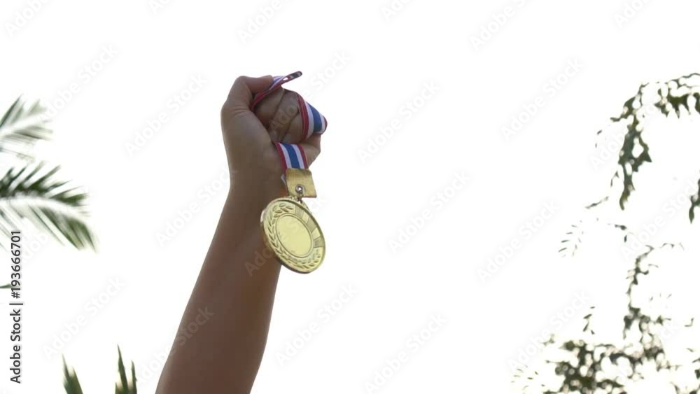 Winners success award concept. Blurred of hands raised and holding gold ...