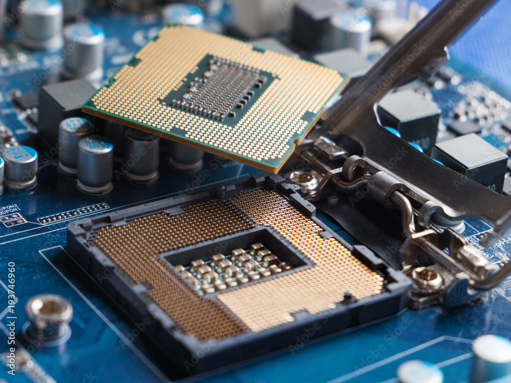 Bottom side of an modern CPU, showing its pins and CPU Socket on ...
