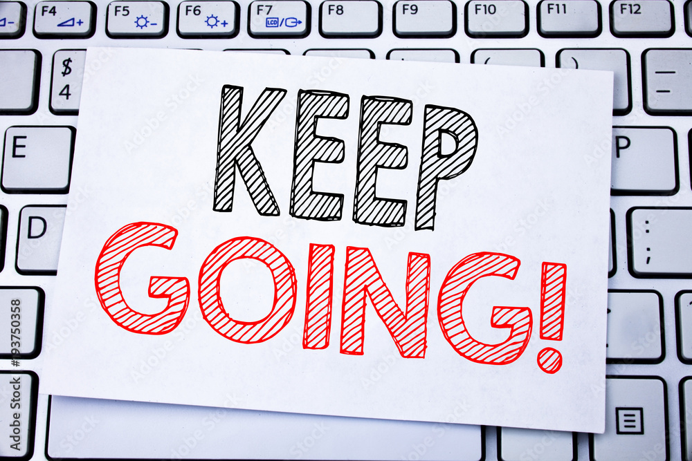 Handwritten text caption showing Keep Going. Business concept writing ...