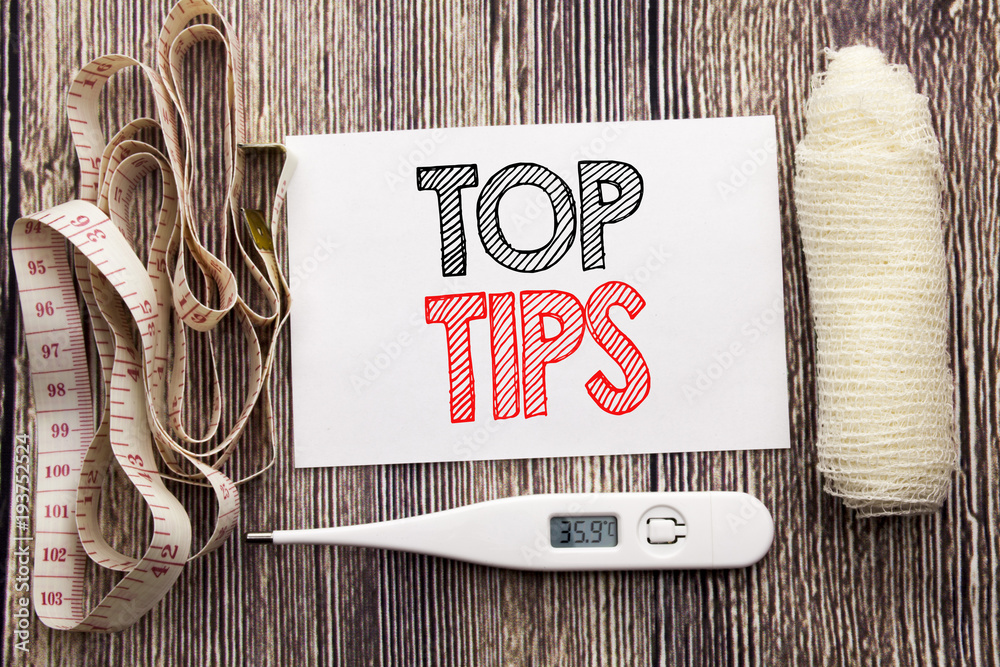 Handwritten text showing Top Tips. Business fitness health concept ...