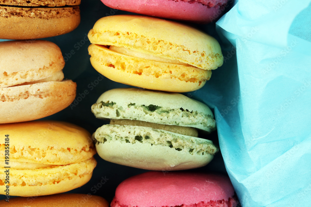 Different types of macaroons or macarons in a box Stock Photo | Adobe Stock