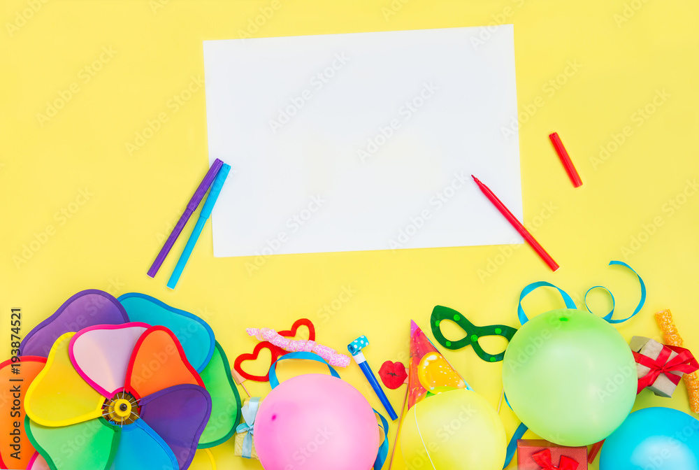 Bright yellow Festive background with empty blank and party tools and ...