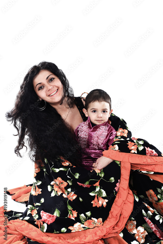 Gypsy family: happy mother and son in national costumes Stock Photo ...