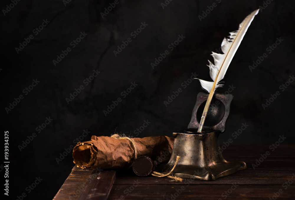Ancient Inkwell, feather pen, old scroll paper with a seal Stock Photo ...