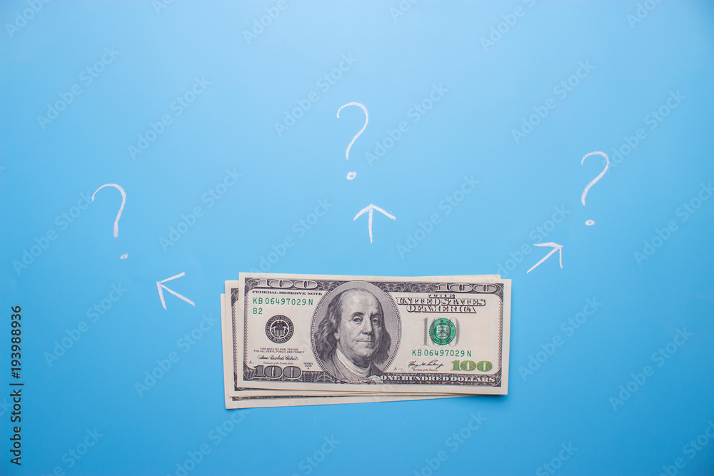 money with arrow and question mark Stock Photo | Adobe Stock