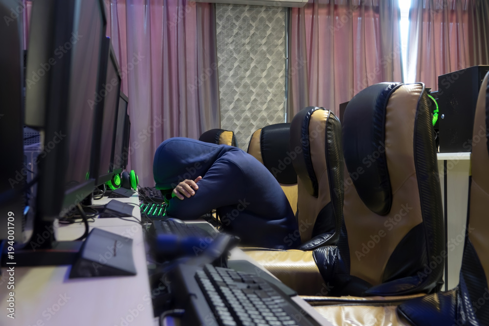 Stressed gamer while playing computer games until morning at internet ...