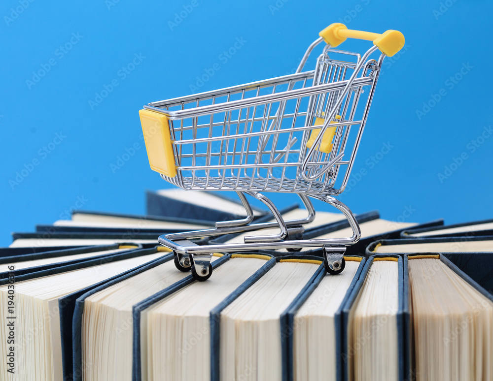 Books with trolley symbol of bookshop Stock Photo | Adobe Stock