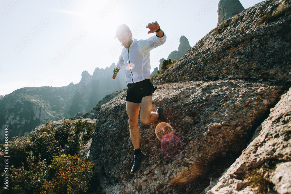 Professional athlete runs down steep climb during ultra marathon train ...