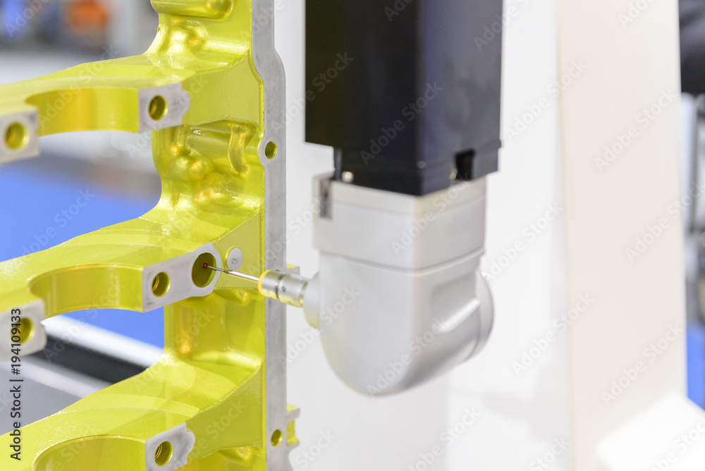 The multi-axis coordinate Measuring Machine, CMM prob measures the work ...