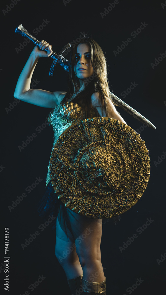 valkyrie warrior, woman with golden armor iron coat and big warrior ...