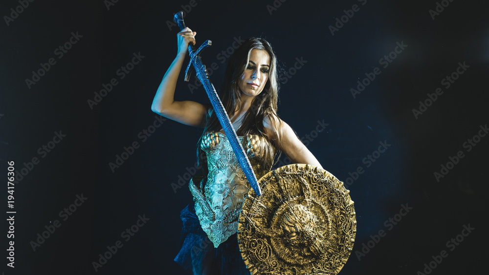 valkyrie warrior, woman with golden armor iron coat and big warrior ...