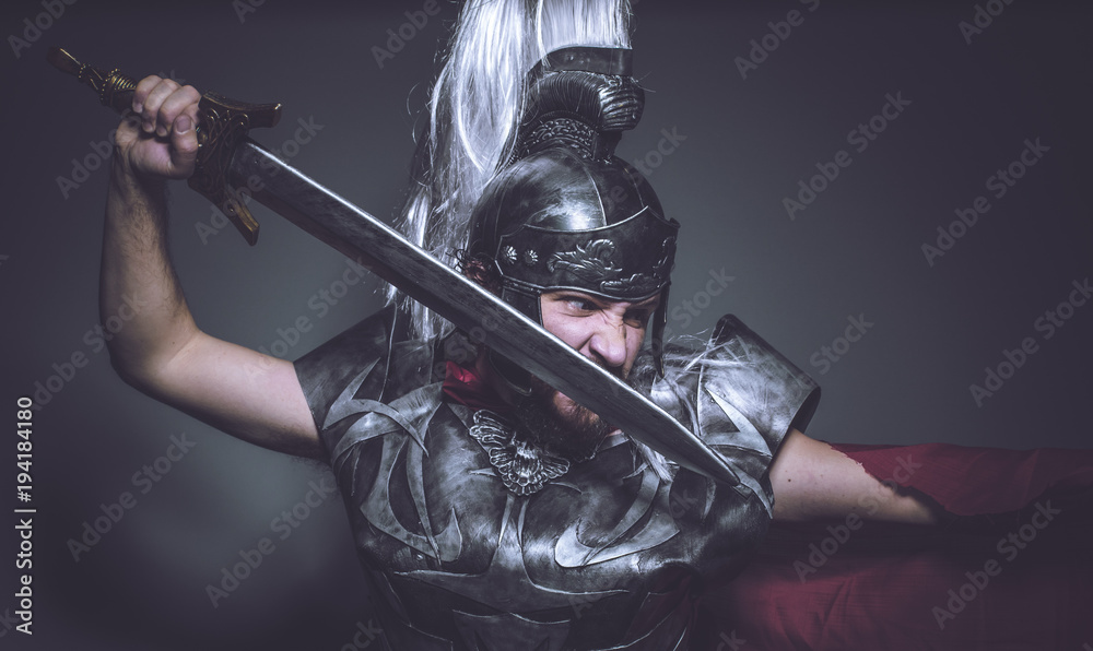 Roman gladiator, wrestler and warrior of Rome with helmet and red cloak ...