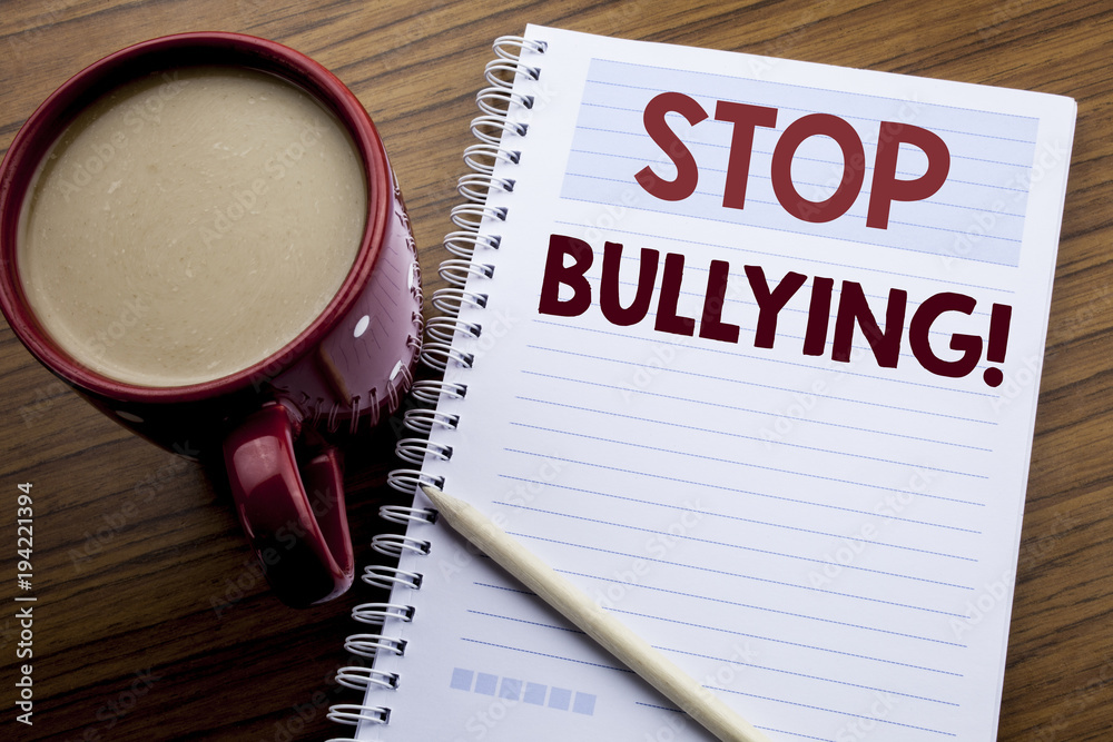 Hand writing text caption inspiration showing Stop Bullying. Business ...