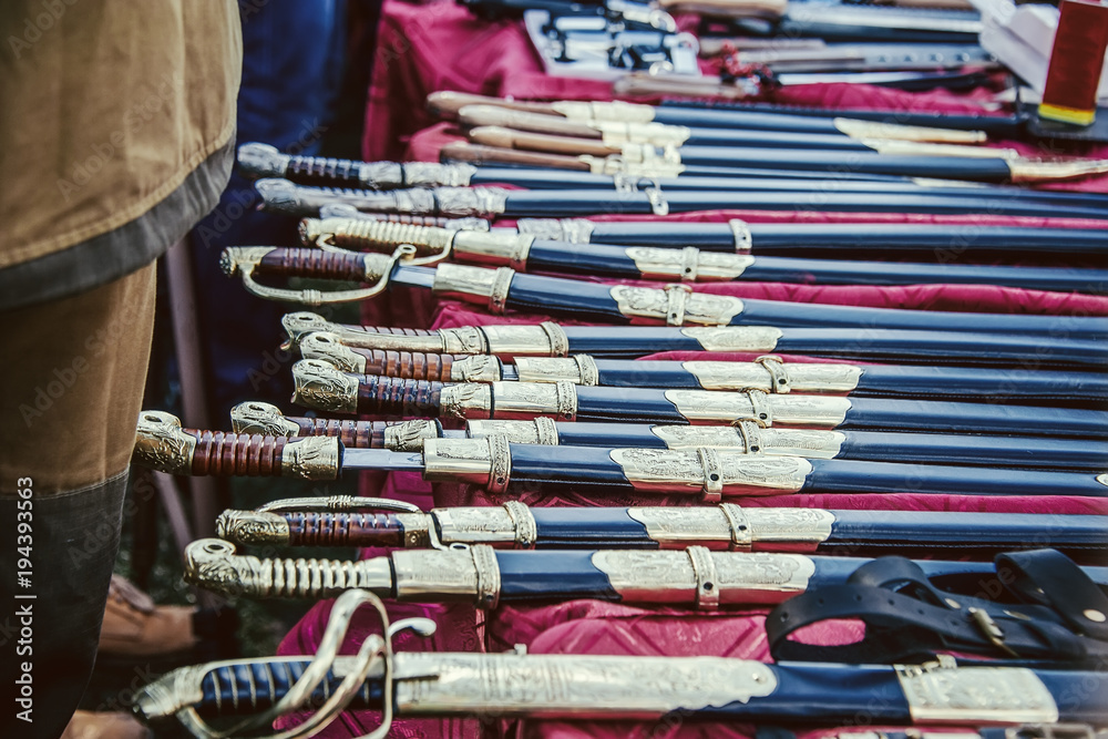 Foto de Selling cold arms of the Cossacks in the street. Sabers and ...