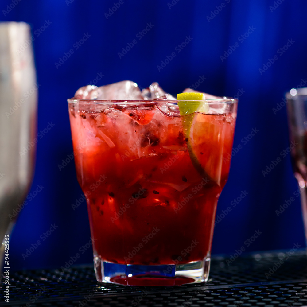 Cocktail in the rocks glass at the bar counter Stock Photo | Adobe Stock