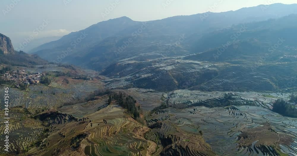 Drone flight over the magnificent Yuanyang Rice Terraces, shaped and ...