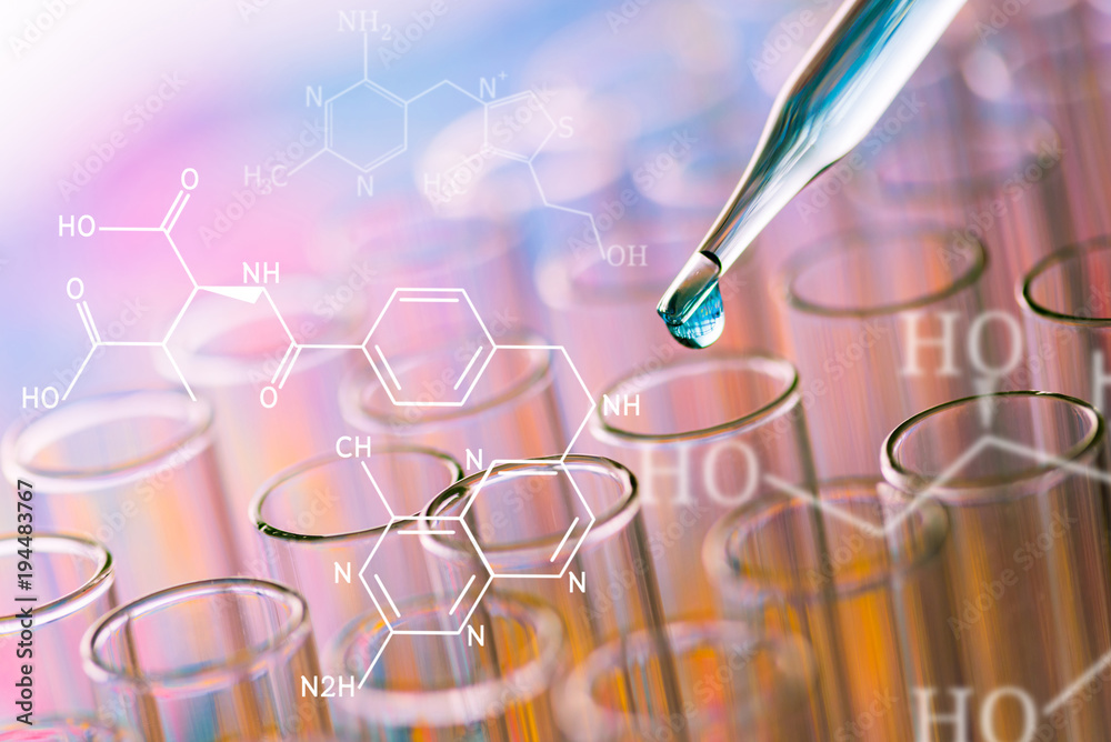 science laboratory test tubes with chemical formula on screen , lab ...