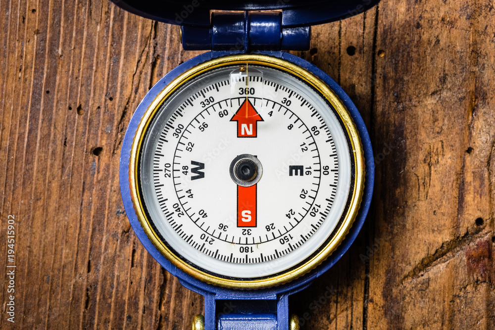 Compass on Wooden Background Stock Photo | Adobe Stock