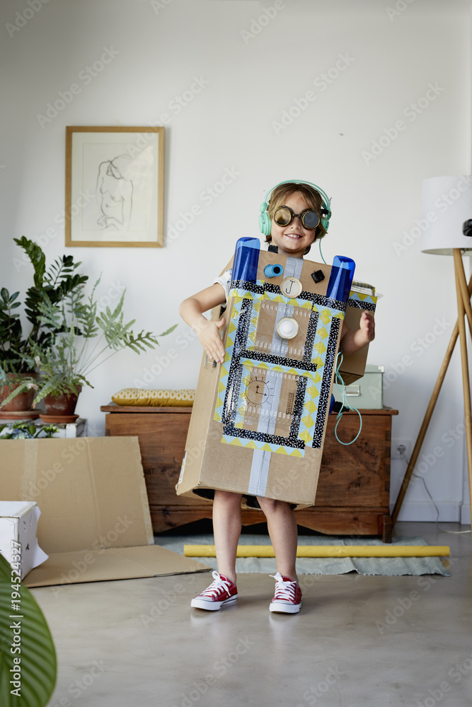 Happy Boy In Robot Costume At Home Stock Photo | Adobe Stock