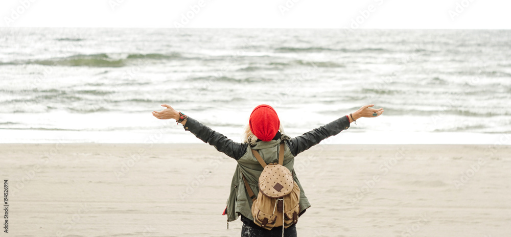 Back view of female enjoying beach Stock Photo | Adobe Stock