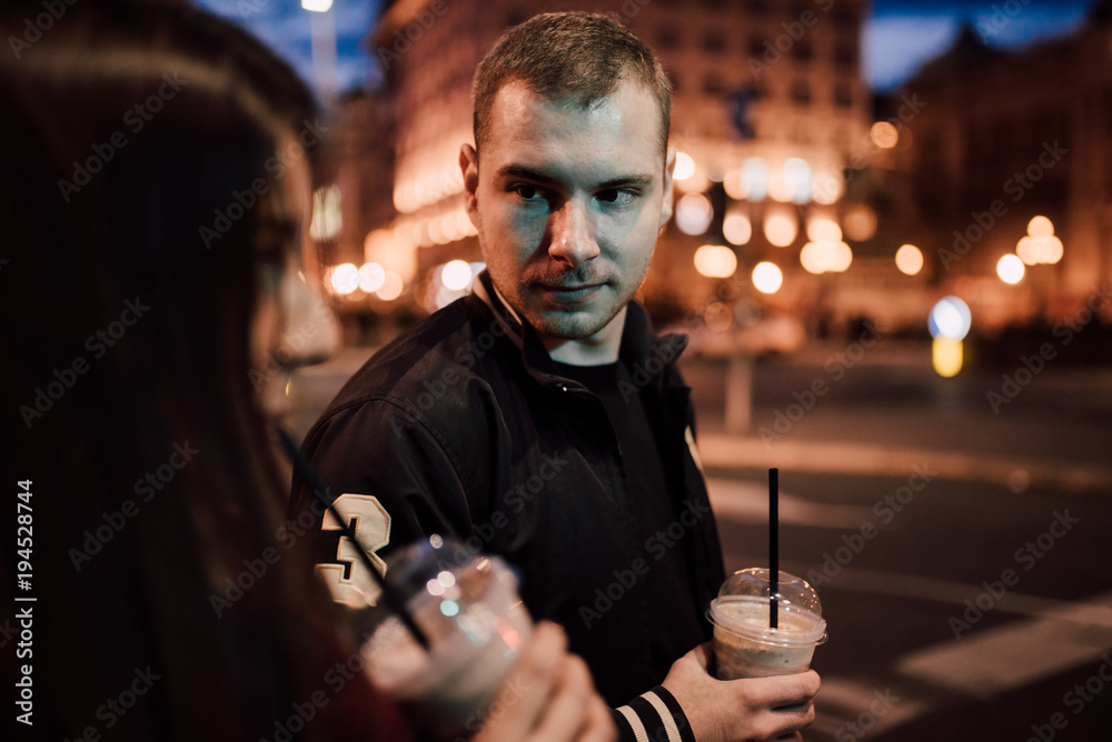 Two friends drinking coffee outdoors Stock Photo | Adobe Stock