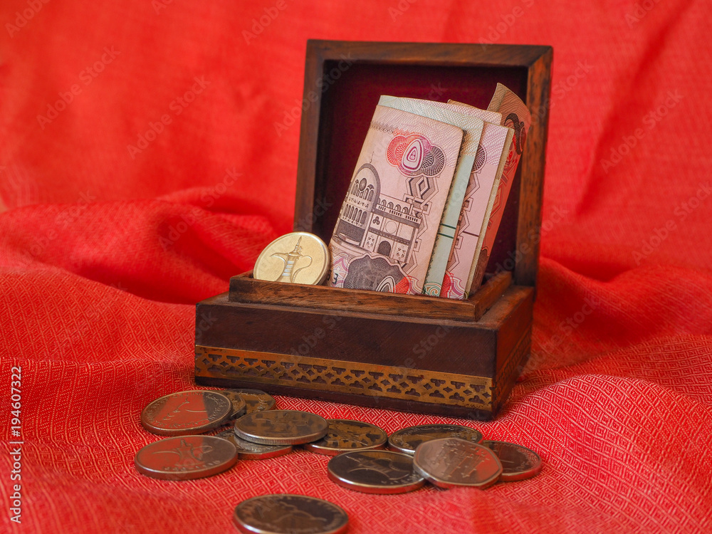Arabic money dirham currency notes and coins. The money in the box ...