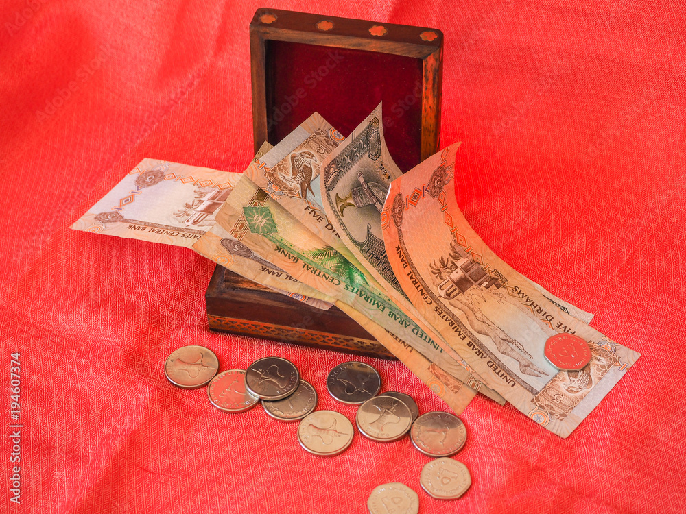Arabic money dirham currency notes and coins. The money in the box ...