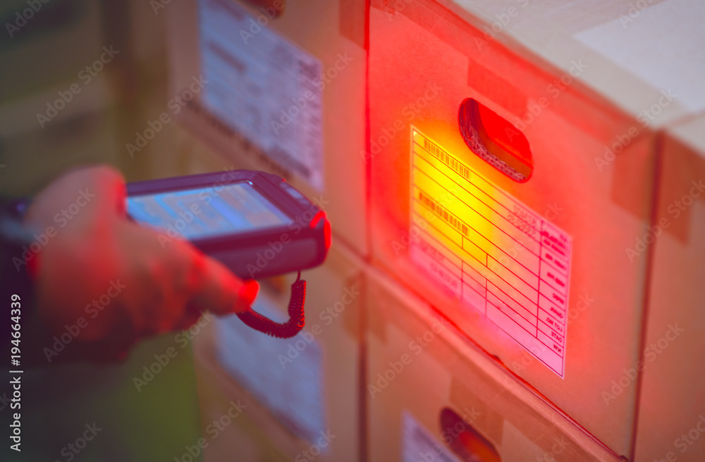 Handheld scanning barcode to inventory in a warehouse. Stock Photo ...