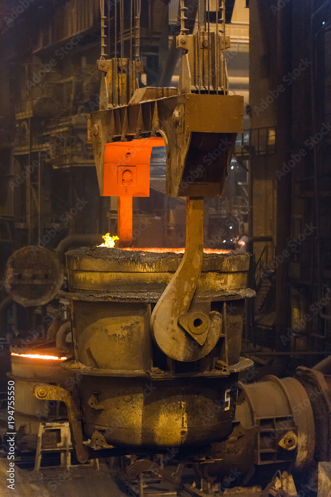 Melting of metal in a steel plant. High temperature in the melting ...