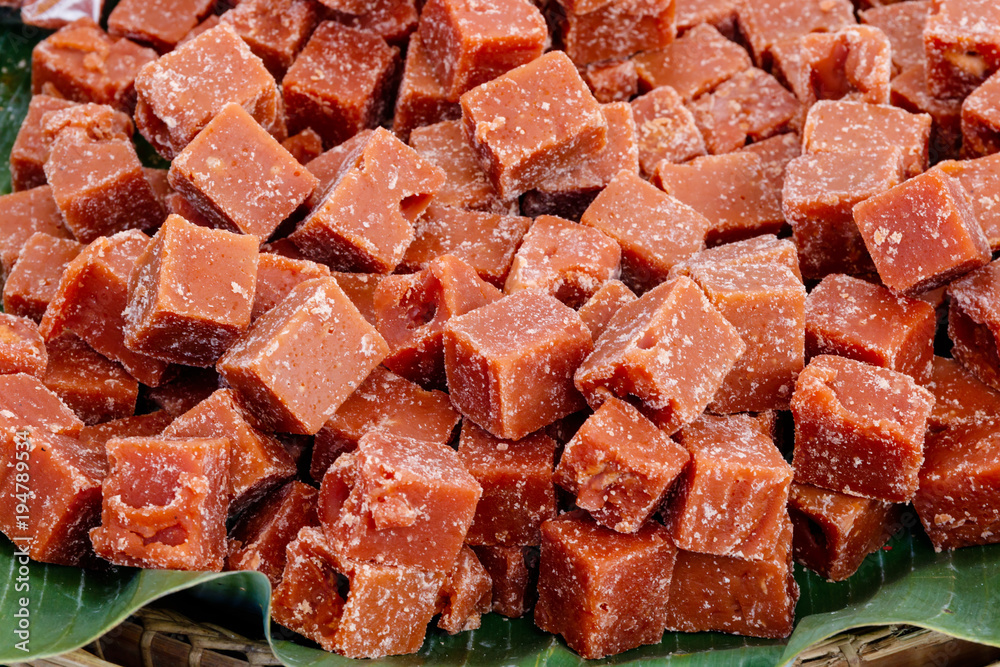Thai traditional oganic food, brown sugar made of cane sugar jaggery ...
