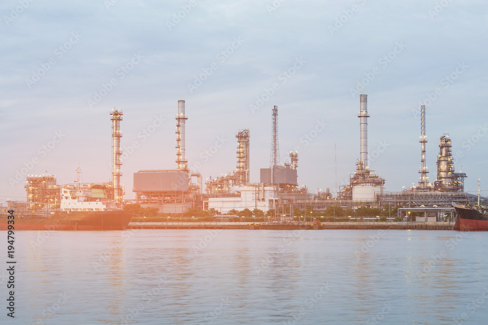 Oil refinery river front, industrial petroleum background Stock Photo ...