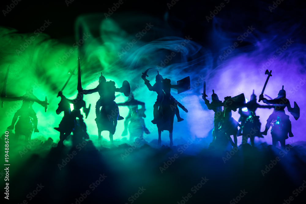 Medieval battle scene with cavalry and infantry. Silhouettes of figures ...